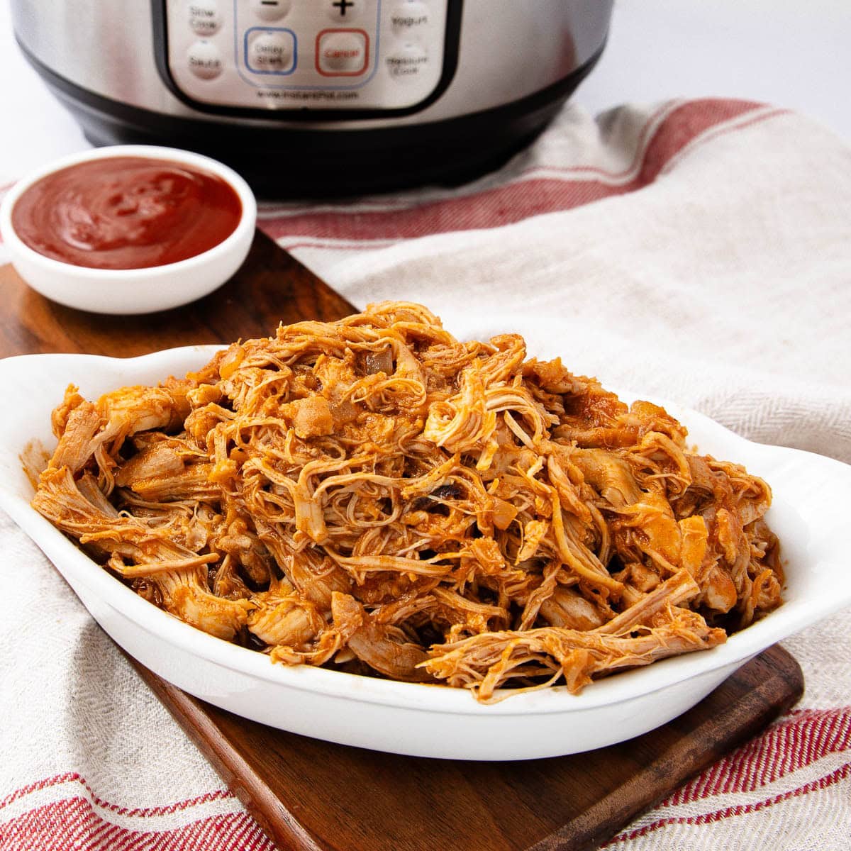 Instant Pot Pulled BBQ Chicken That’s Tender and Saucy
